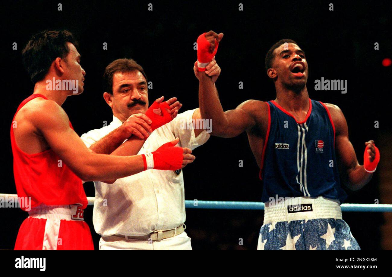 Thailand's Veongviact Phongsit, left, tries to congratulate the ...