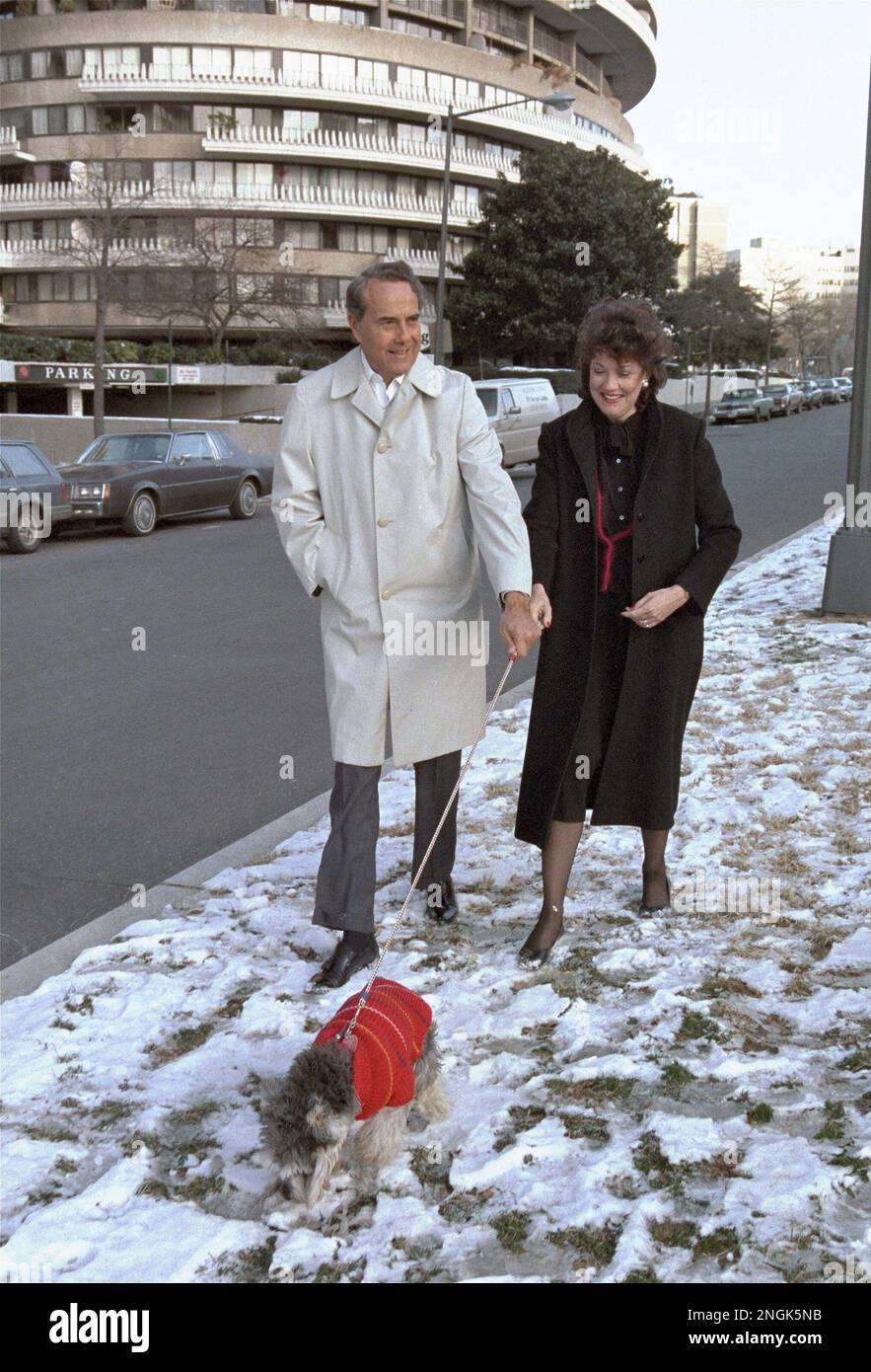 Sen. Bob Dole is seen with his wife Elizabeth walking their dog Leader ...