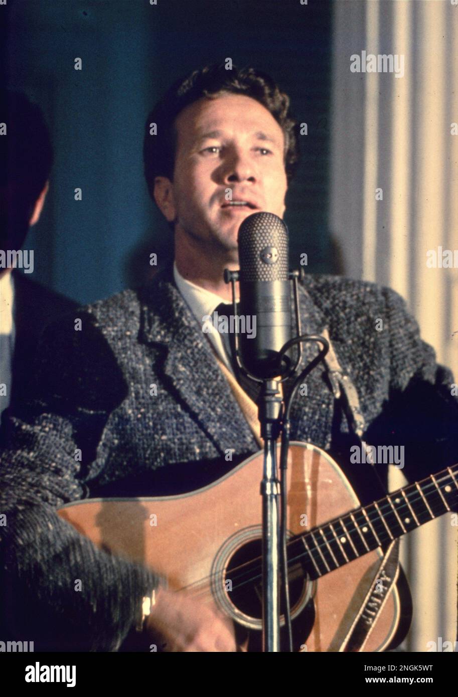 Country Western singer Marty Robbins, is shown singing and playing his ...