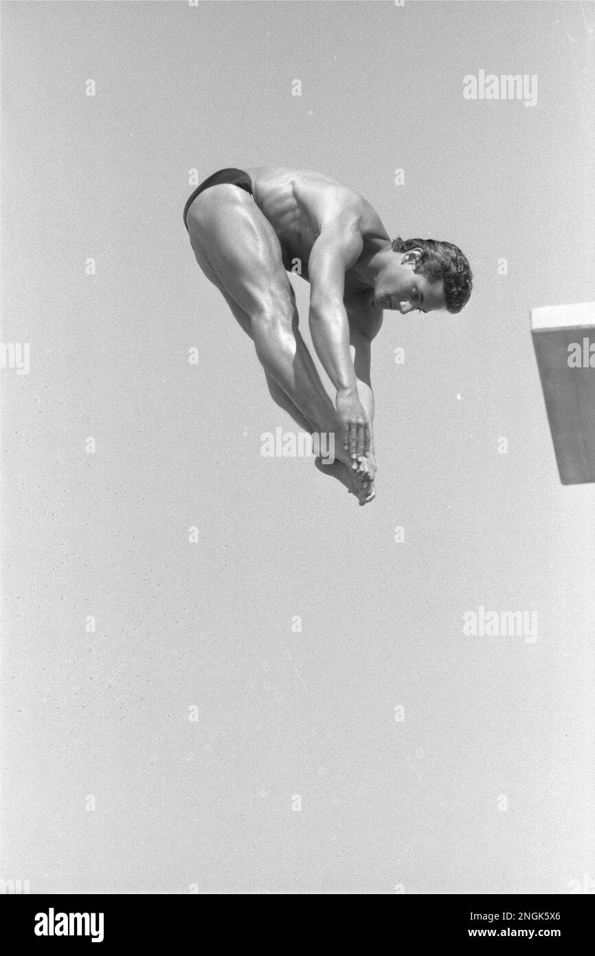 United States diver Greg Louganis performs in the springboard event ...