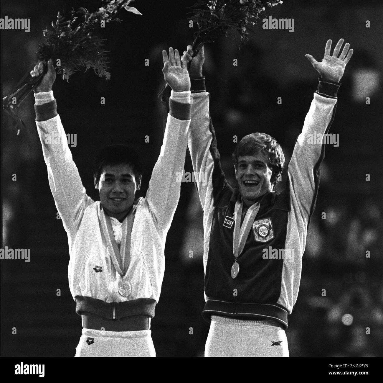 Li Ning of the Peoples' Republic of China, left, and Peter Vidmar of ...