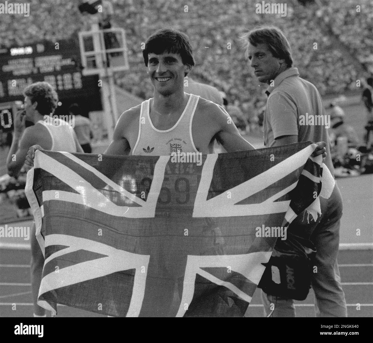 Britain's Sebastian Coe holds up the Union Jack Saturday after winning ...