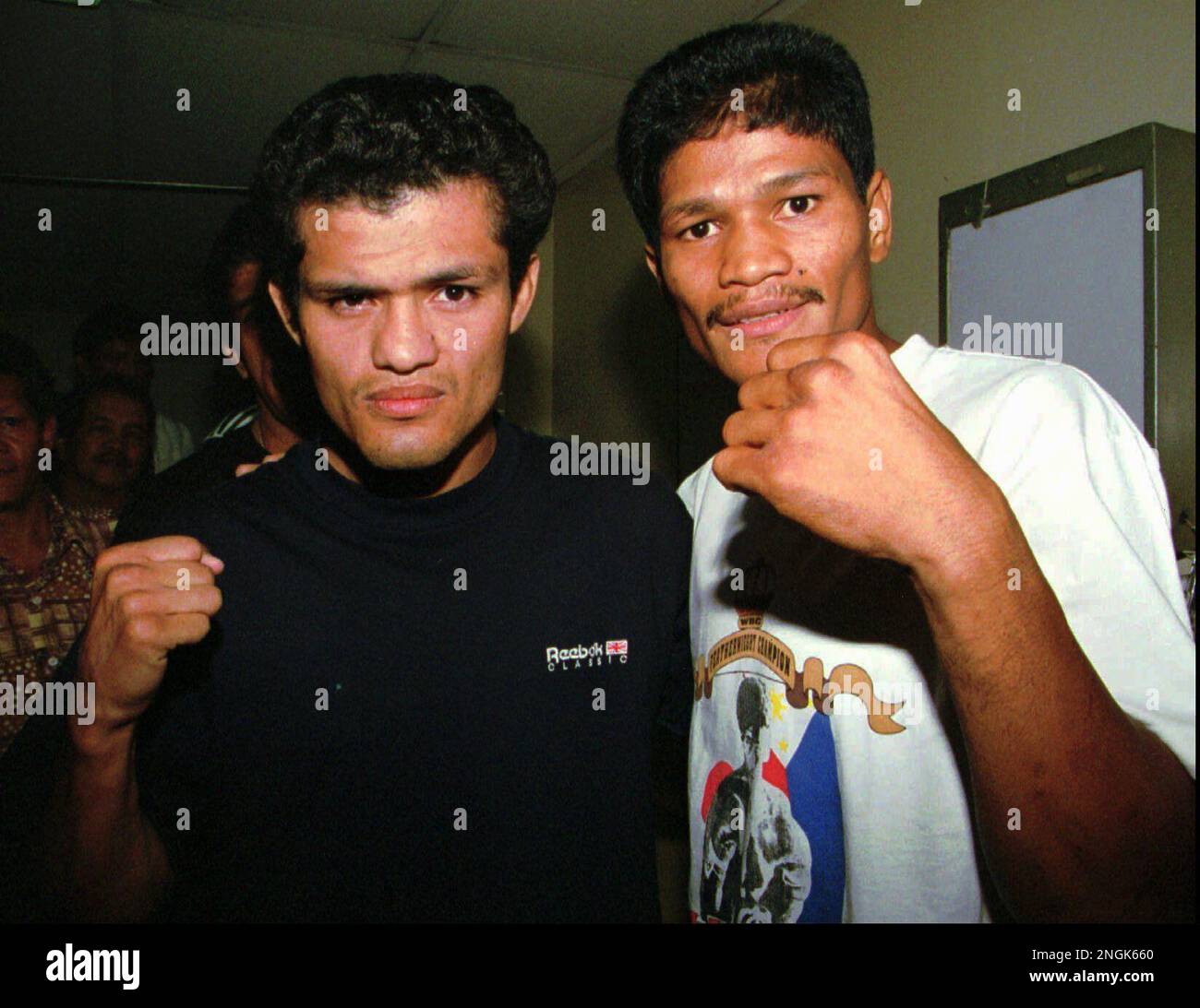 Defending WBC Featherweight champion Luisito Espinosa, right, of the ...