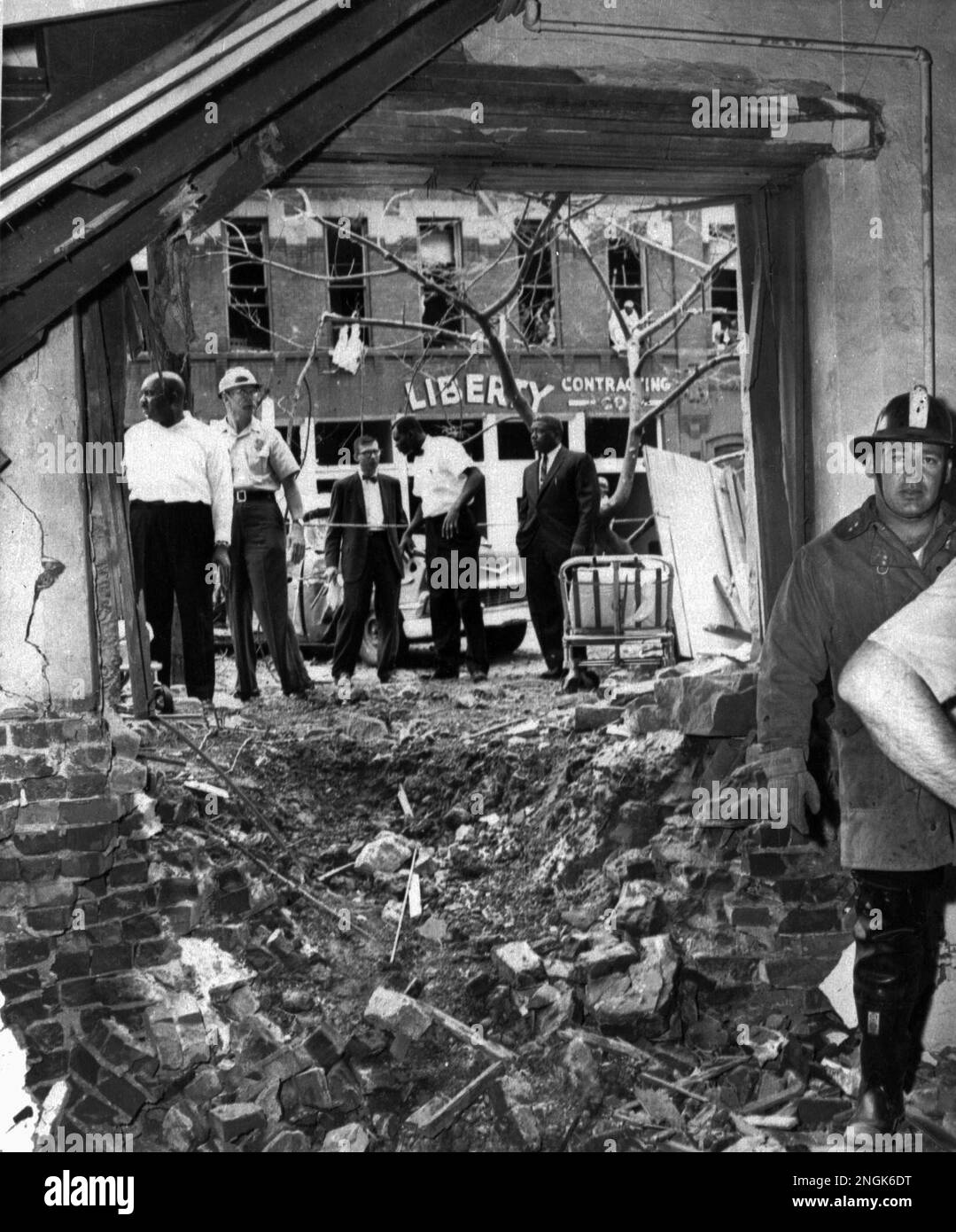 This large crater is the result of a bomb that exploded near a basement ...