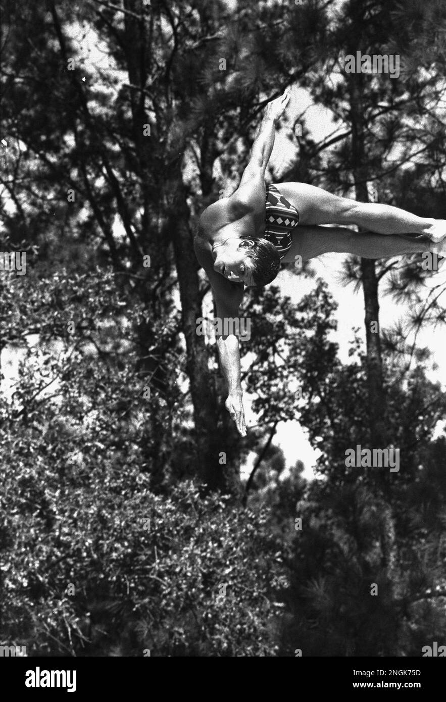 Lt. Phil Boggs of the U.S. Air Force soars through a half twist ...