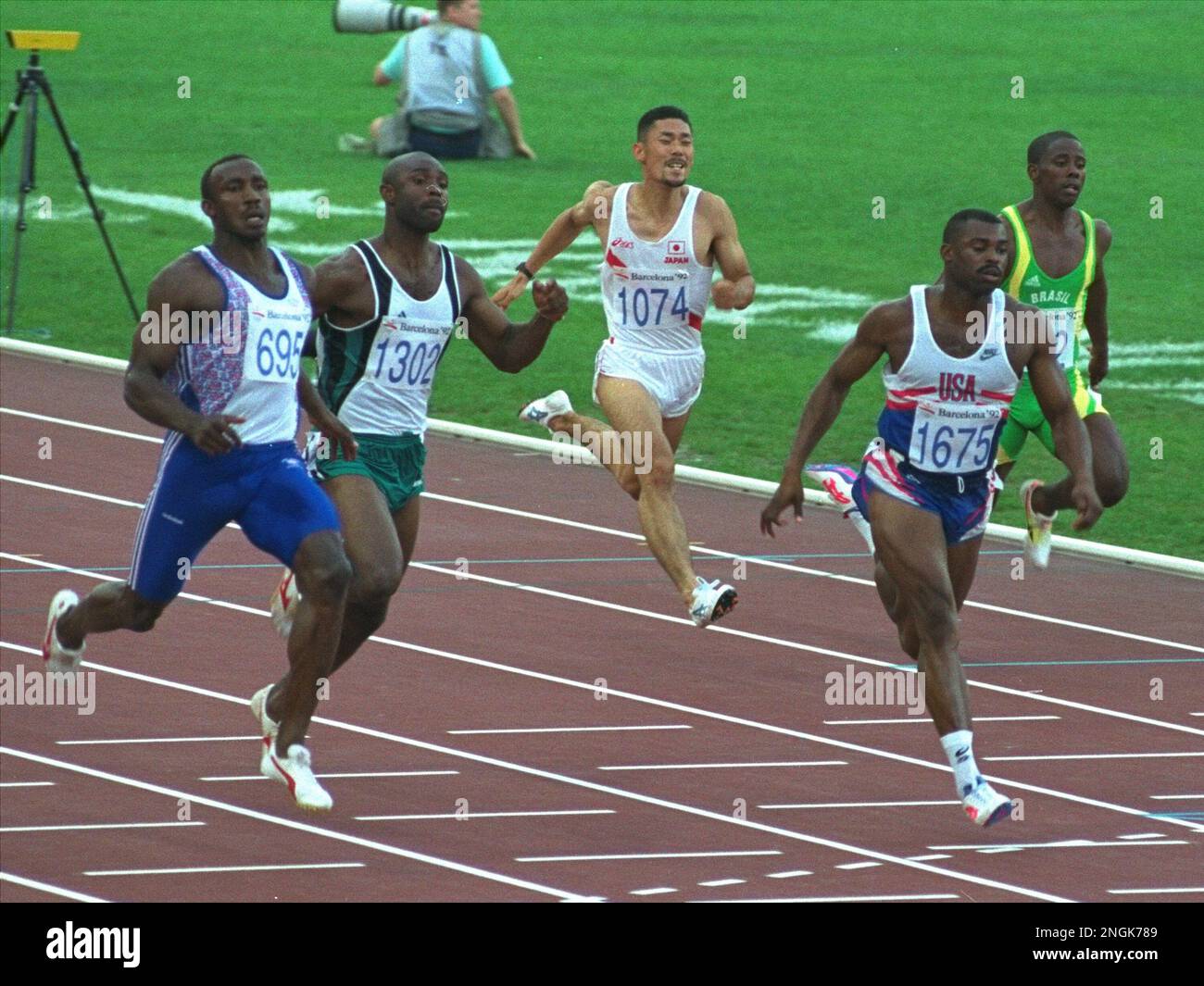 Linford Christie of Great Britain, left, wins the 100-meter heat in 10. ...