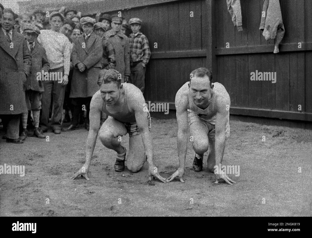 American sprinters and Olympic champions Jackson Scholz, left, and ...