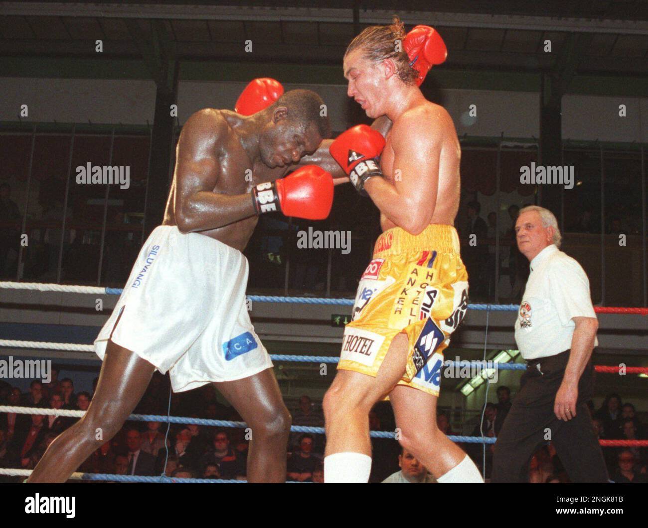 French boxer Joe Siluvangi, left connects to the head of Norway's Ole ...