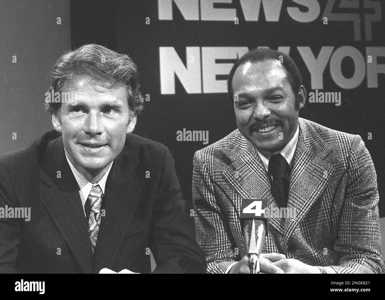 Former Cleveland Mayor, Carl B. Stokes, is shown with co-anchor Paul ...