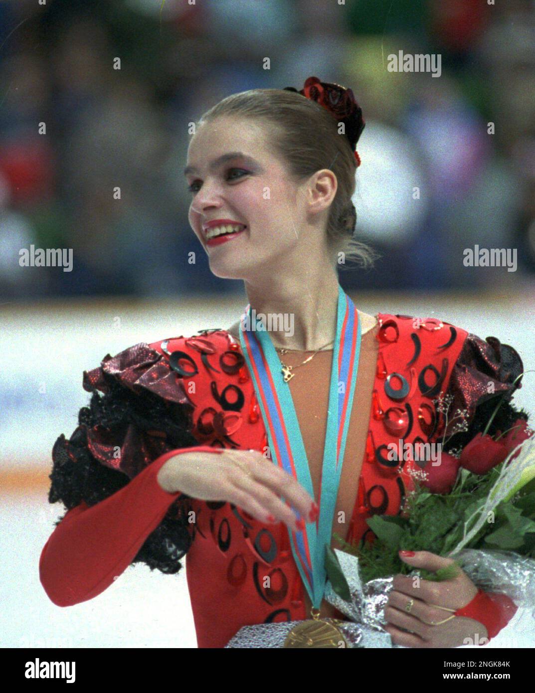 Katarina Witt from East Germany holds her fold medal and roses Feb. 27 ...