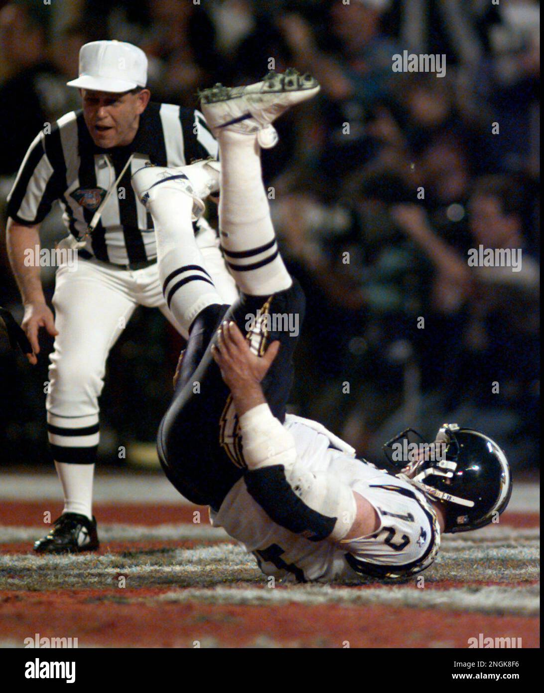 San Diego Chargers quarterback Stan Humphries is knocked down in the ...