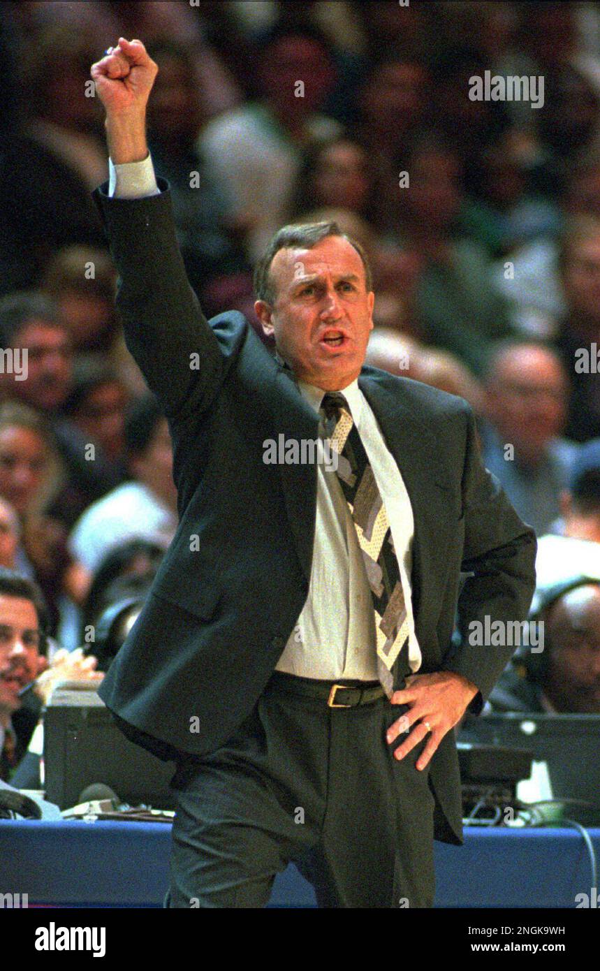 Golden State Warriors new head coach Rick Adelman yells instructions at ...