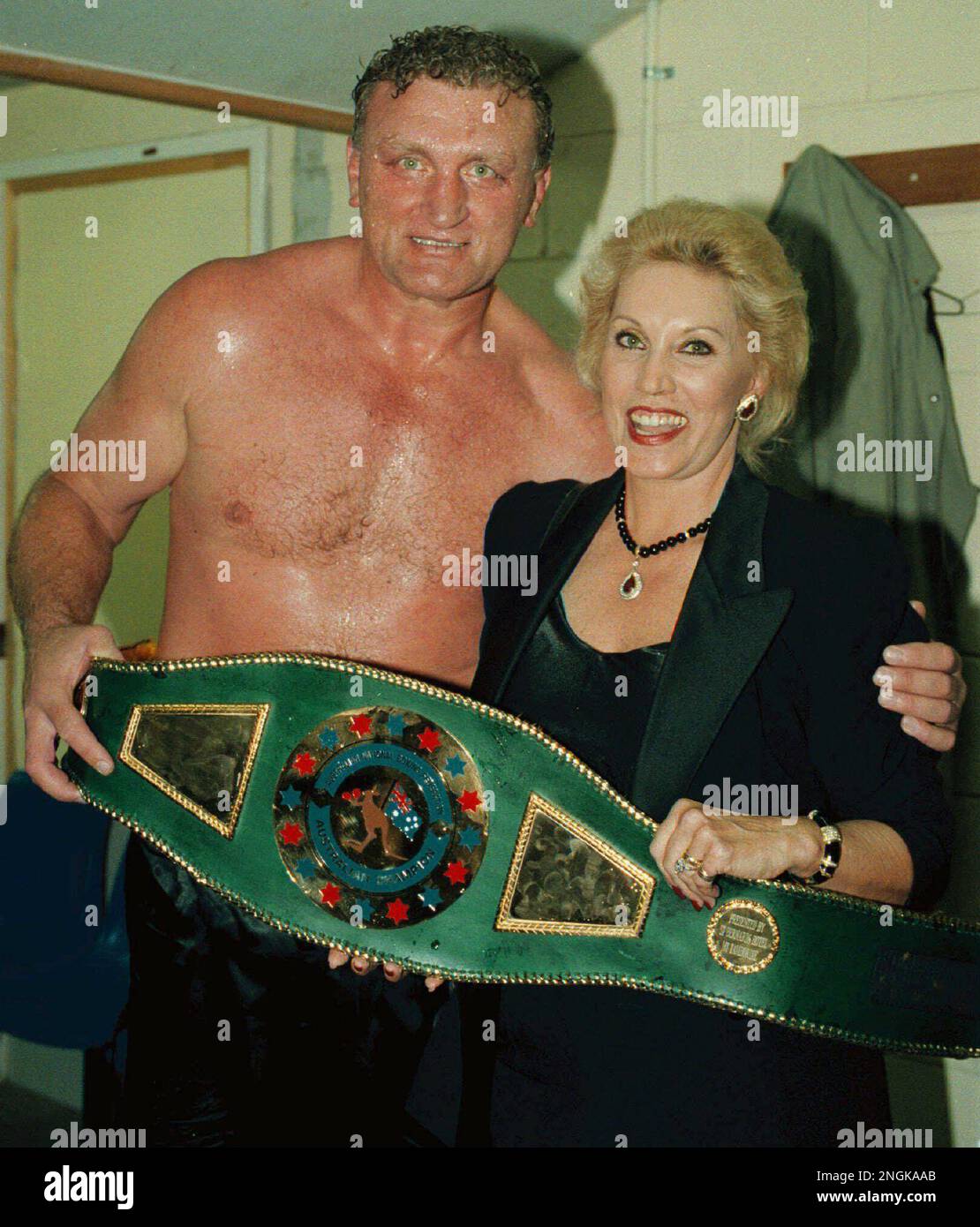 Joe Bugner hugs his wife Marlene, after defeating Vince Cervi to win ...
