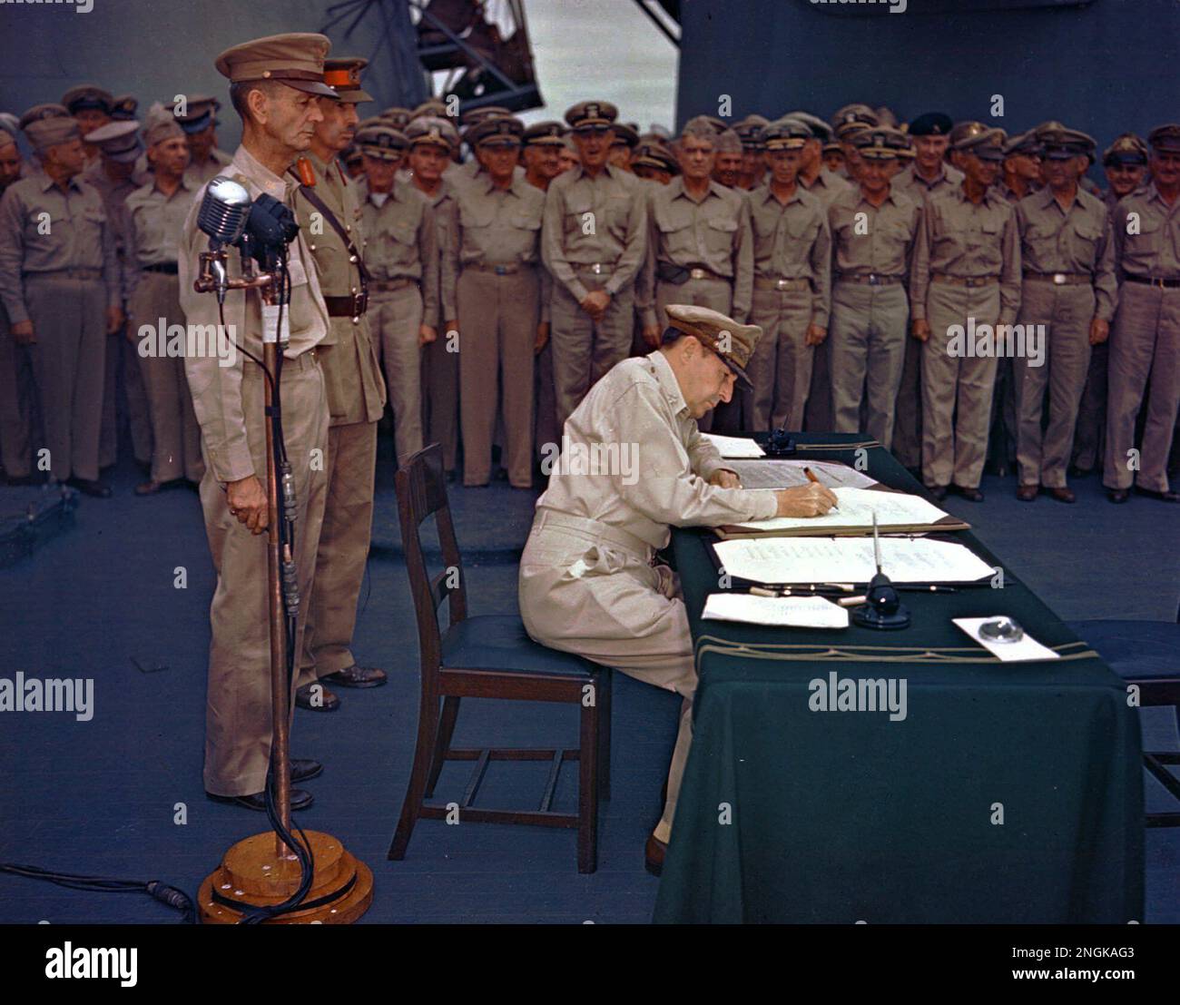 Gen. Douglas MacArthur signs the Japanese surrender documents Sept. 2 ...