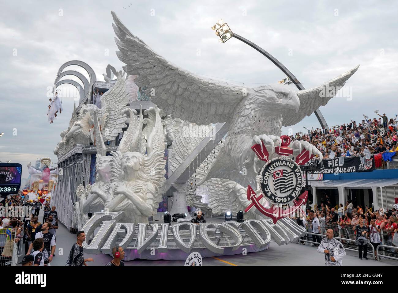 Dancers from the Gavioes da Fiel samba school perform on a float during ...