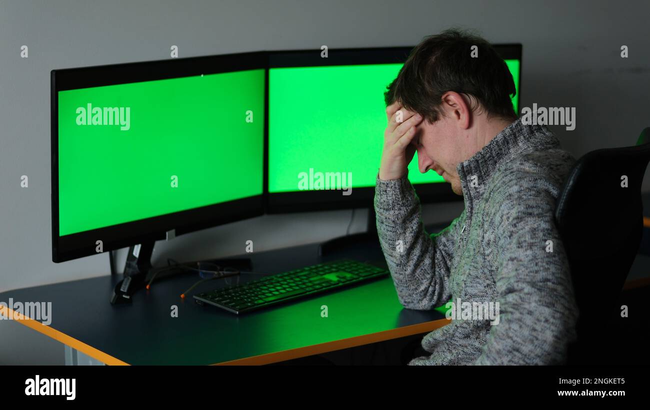 Tired young man feel pain eyestrain holding glasses rubbing dry ...