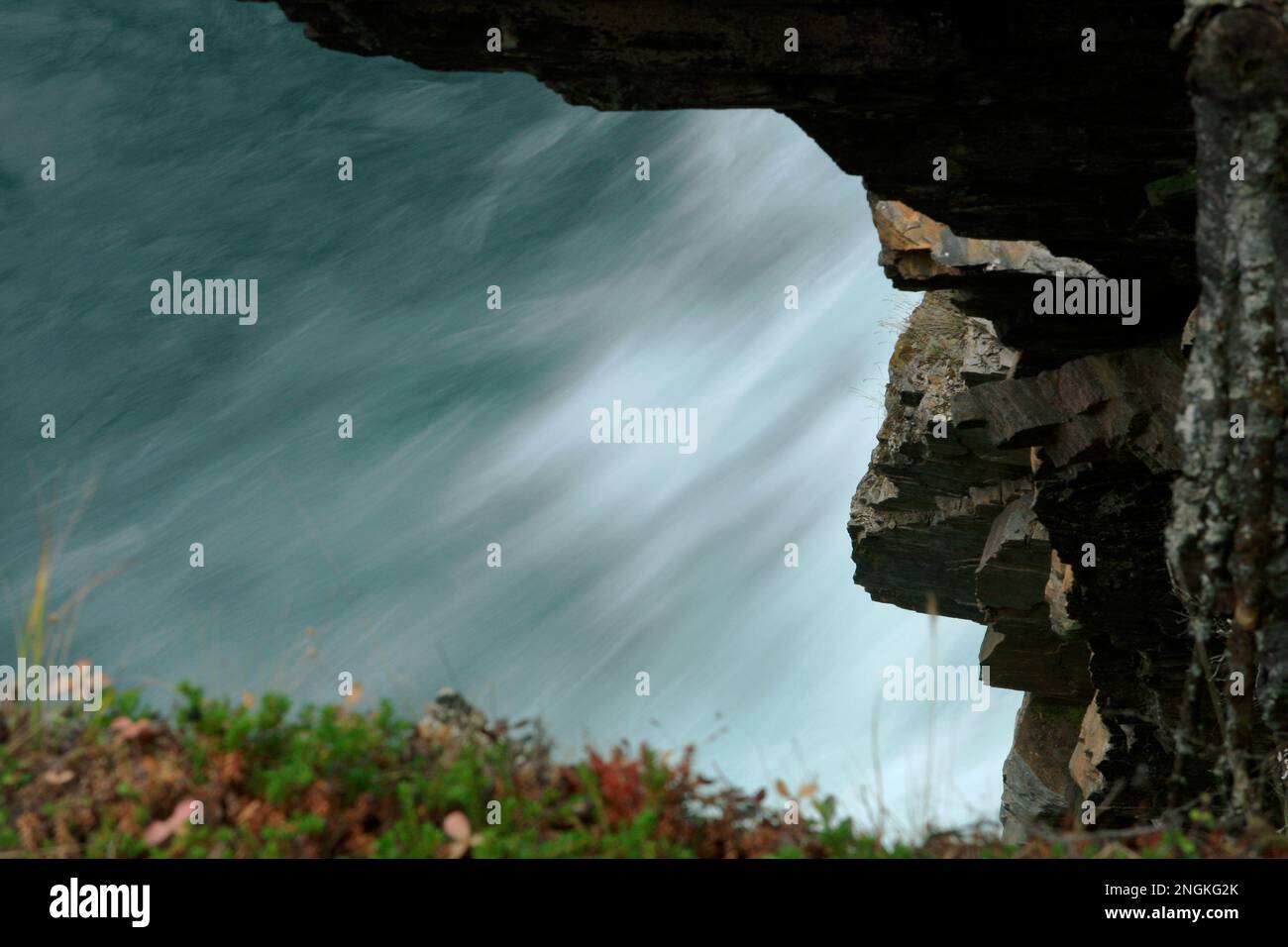 Short river, Jokk up north in the arctic area. Close up on cliff and ...