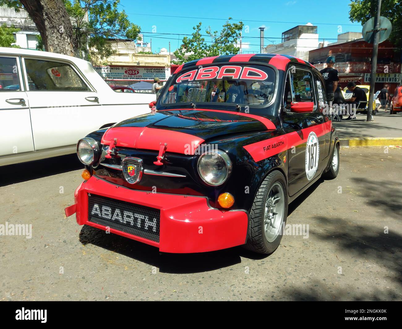 black and red sport Fiat 600 Abarth sedan unibody for racing. Expo ...