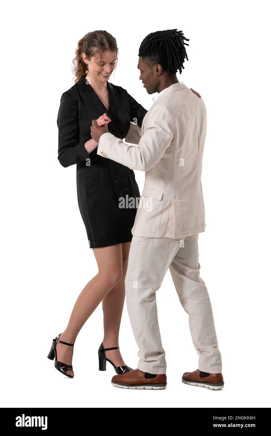 Man in a white suit dancing with a woman in a black dress isolated on ...