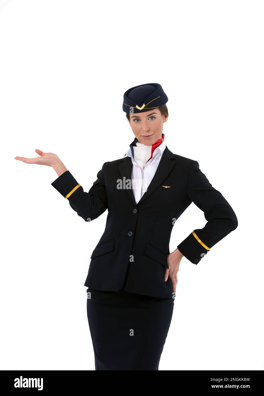Portrait of a female flight attendant standing and welcoming passengers ...