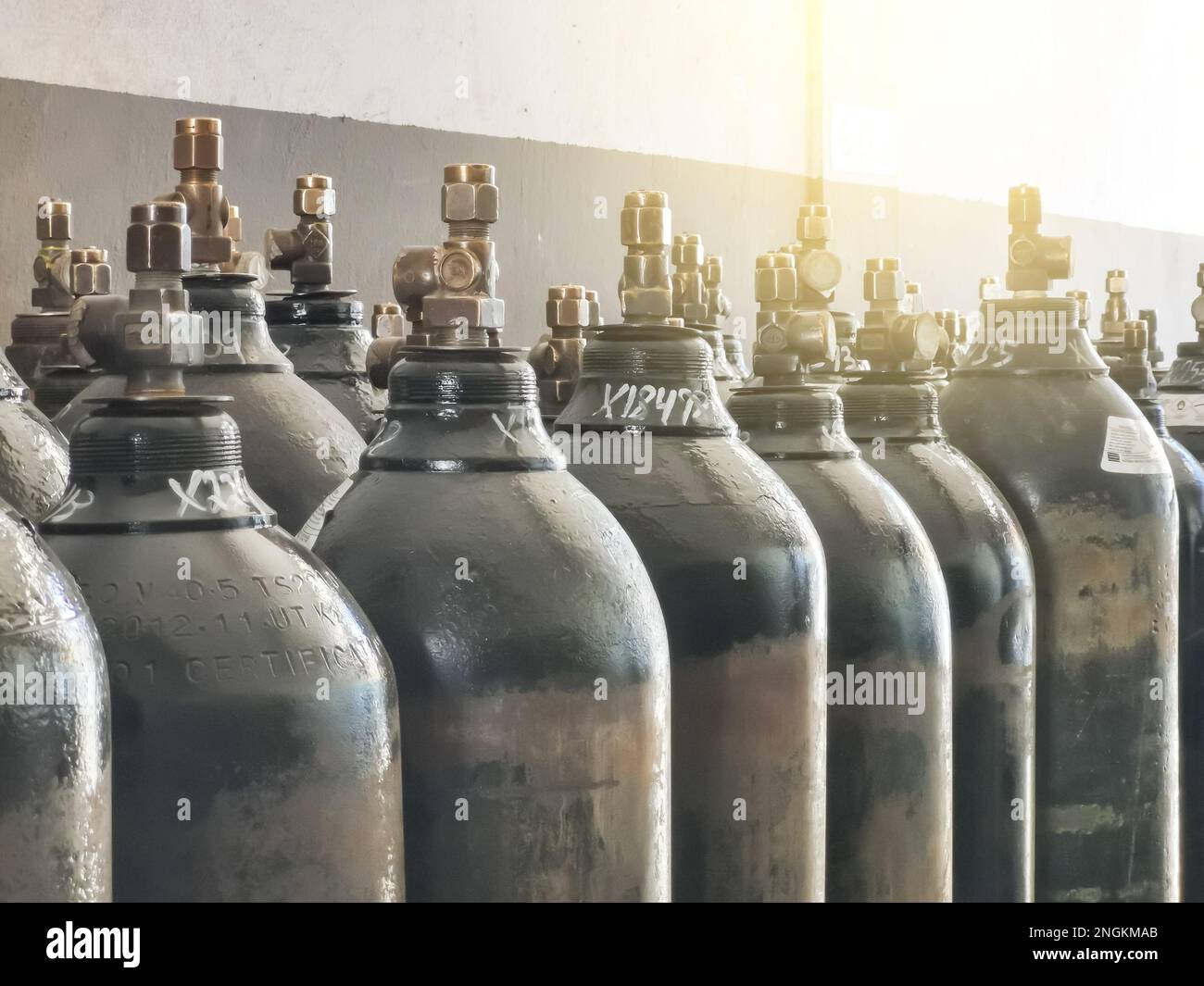 Group of oxygen cylinder tank with compressed gas for industrial use in ...