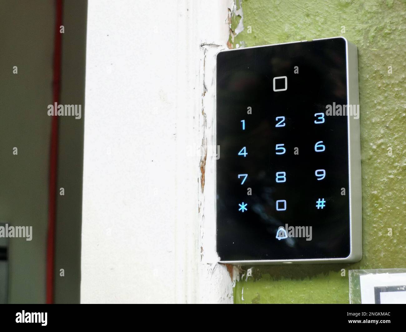 Digital smart door lock security system mount on concrete wall Stock ...