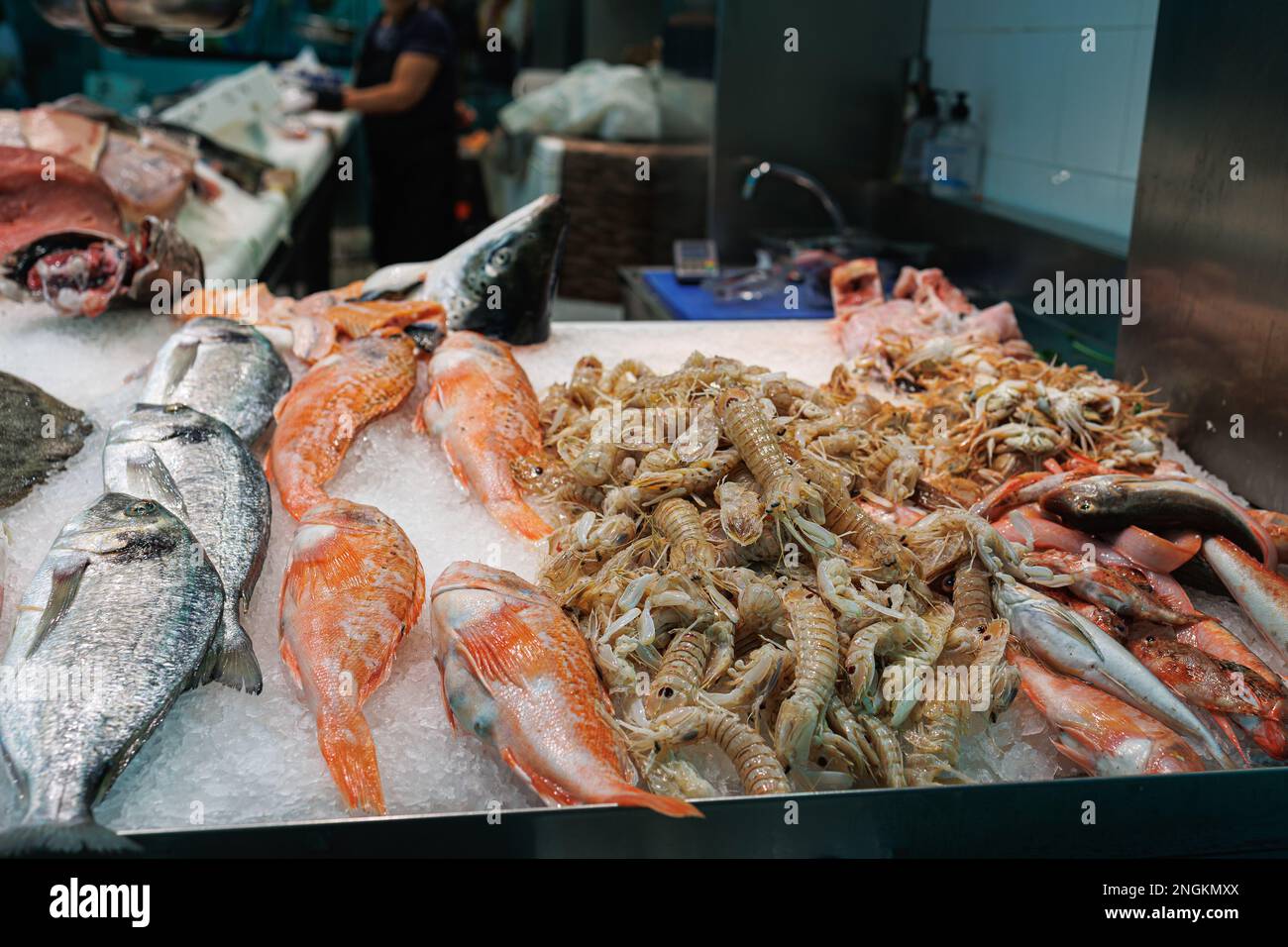 Market Stall with Freshly Caught Fish and Shellfish Stock Photo - Alamy