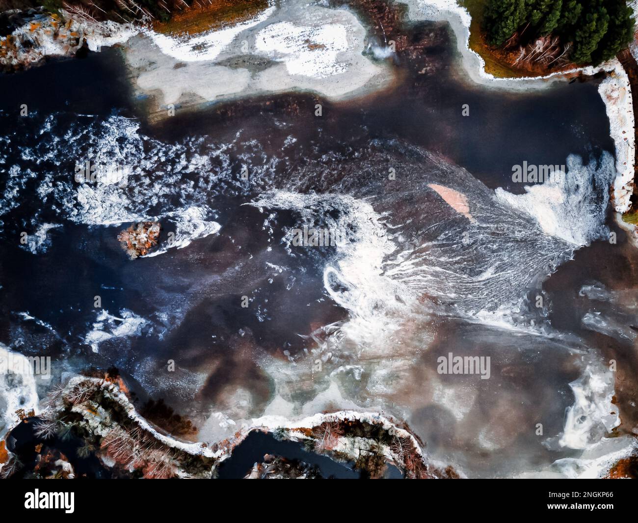 aero drone view of a flooded river during winter, showcasing the ...