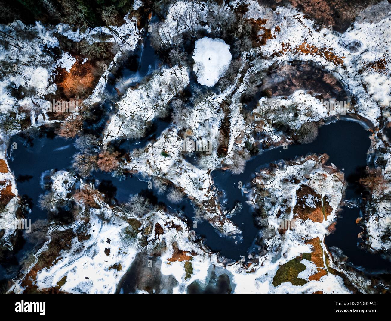 aero drone view of a flooded river during winter, showcasing the ...