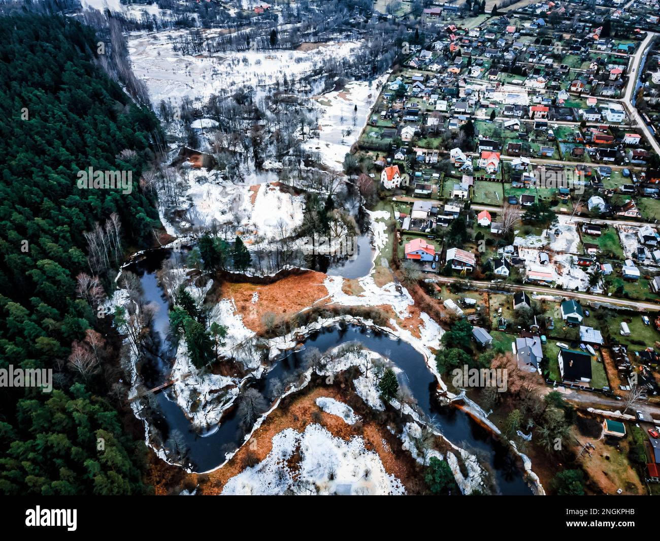 aero drone view of a flooded river during winter, showcasing the ...