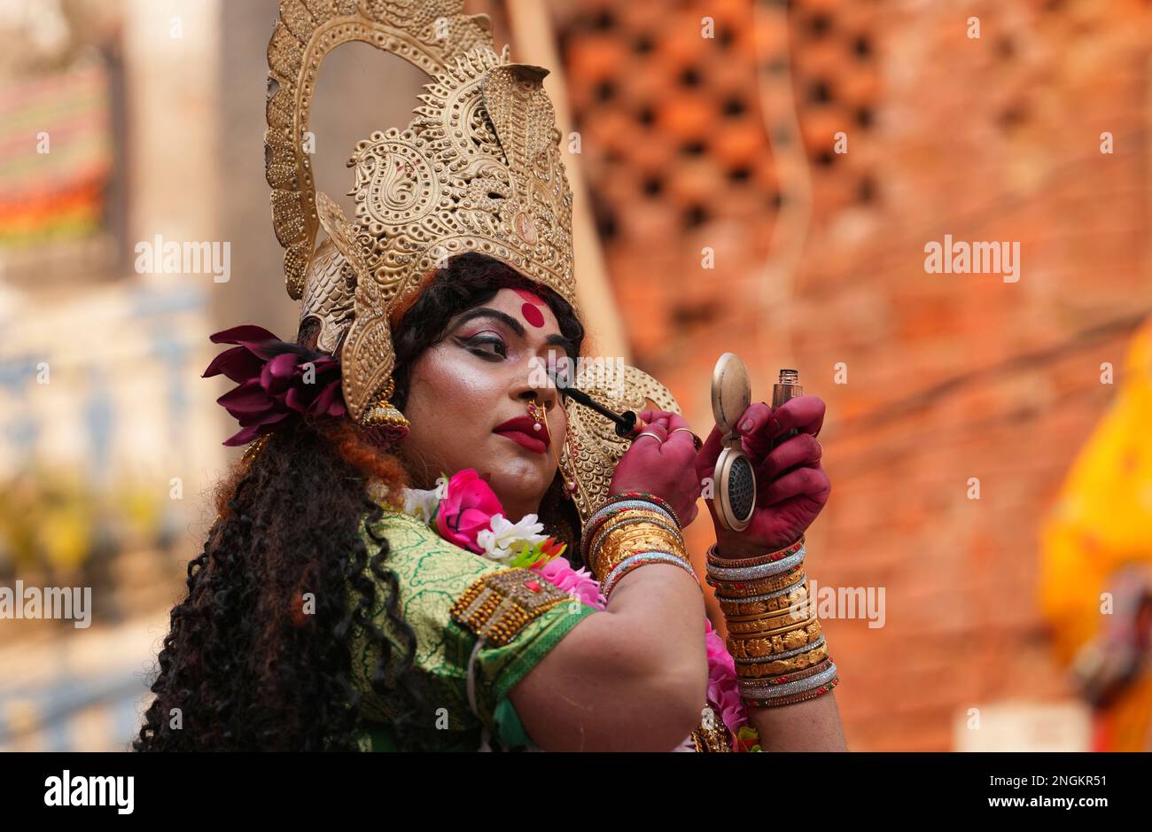 A Kinnar gets ready to participate in a "Maha Shiavratri" procession in ...