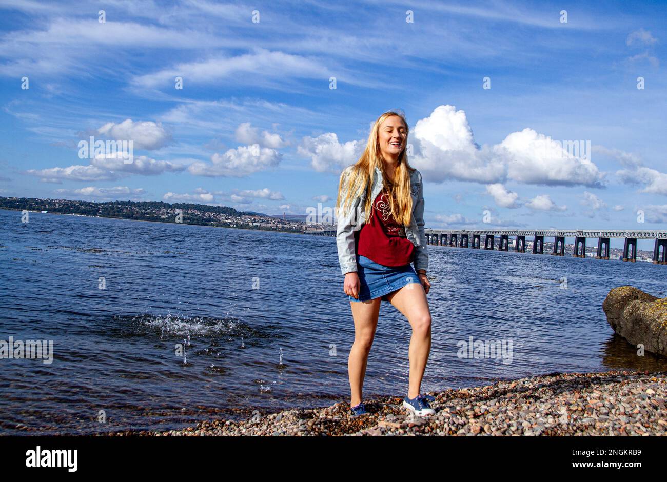 On a beautiful October day in Wormit Beach, Fife, Rhianna Martin throws ...