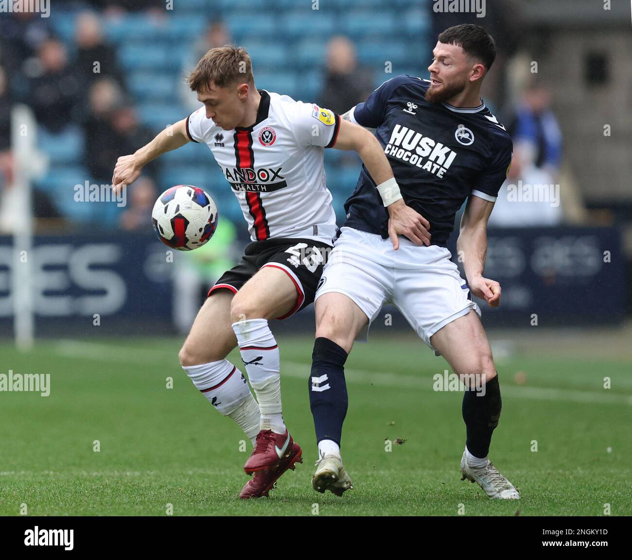 London, UK. 18th February 2023. Ben Osborn of Sheffield Utd tussles ...