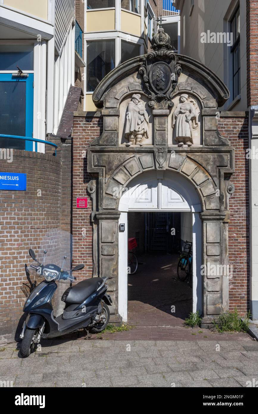 Leper gate (Leprozenpoort) at the Sint Antoniesluis with wall relief ...