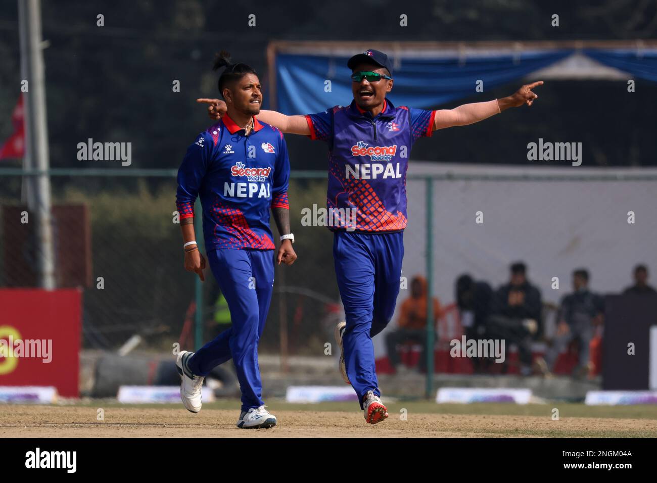 Kathmandu, NE, Nepal. 18th Feb, 2023. Nepal cricket team's captain Rohit Paudel (R) and former ...