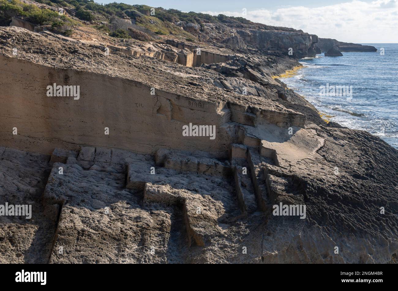 Old quarry of the Mallorcan mares stone, on the rocky coast of the ...