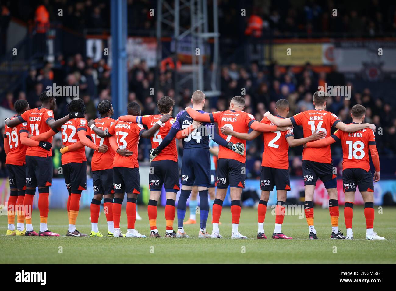 Luton Town players observe a moments silence in memory of Christian ...