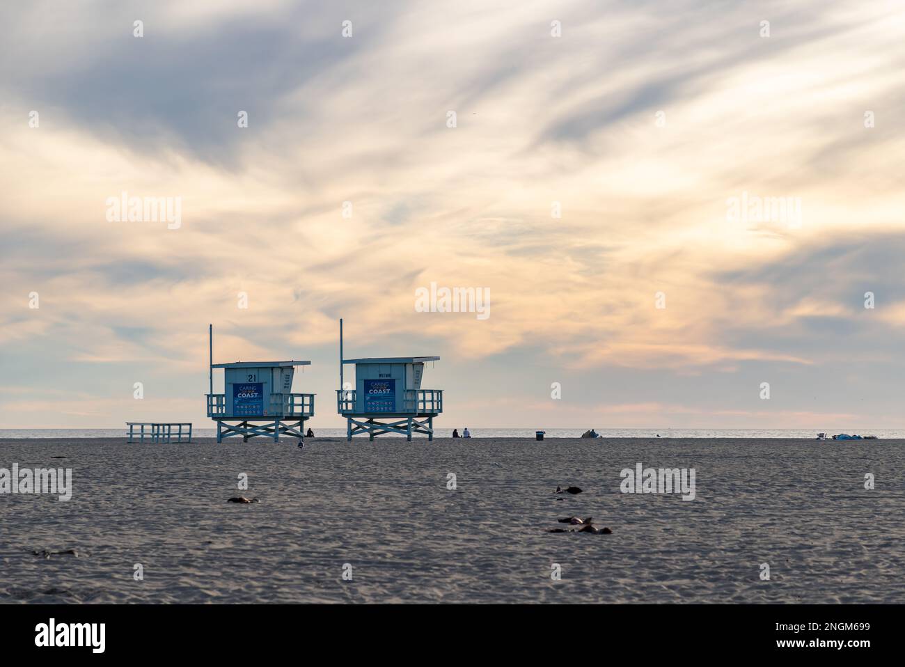 A picture of light blue lifeguard towers on Venice Beach at sunset ...