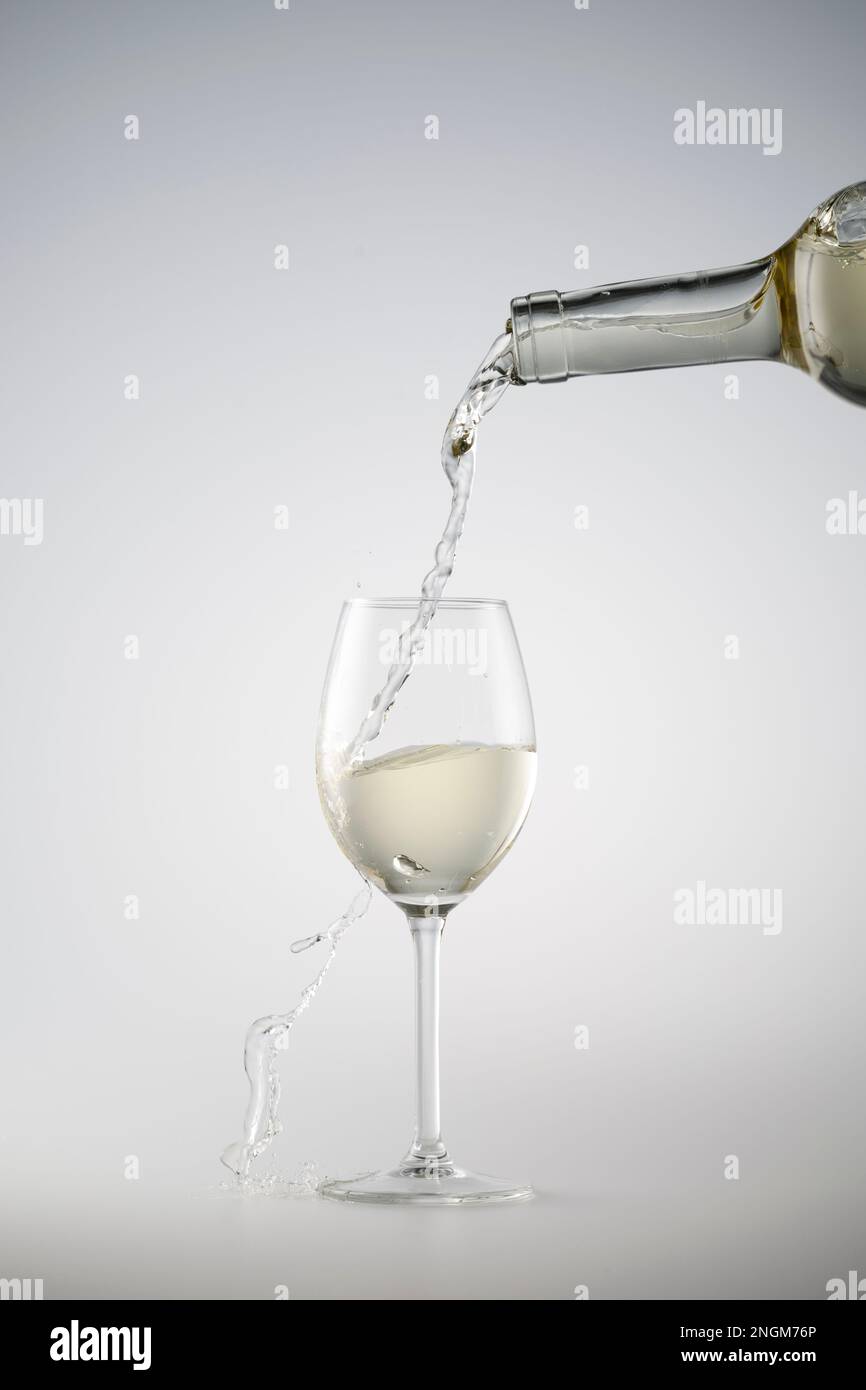 White Wine Bottle Pouring