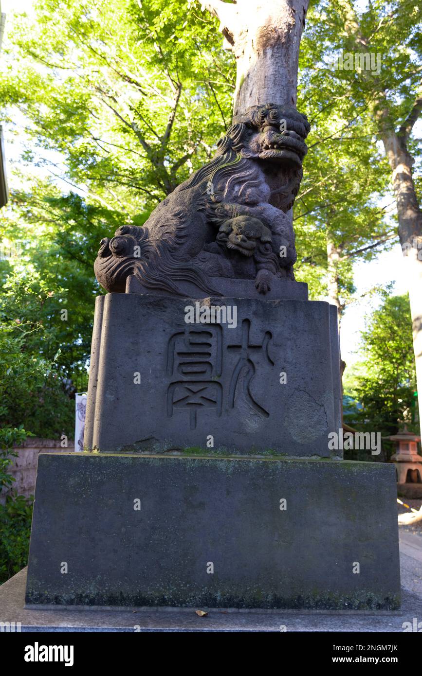 A statue of guardian dog at Japanese Shrine Stock Photo - Alamy