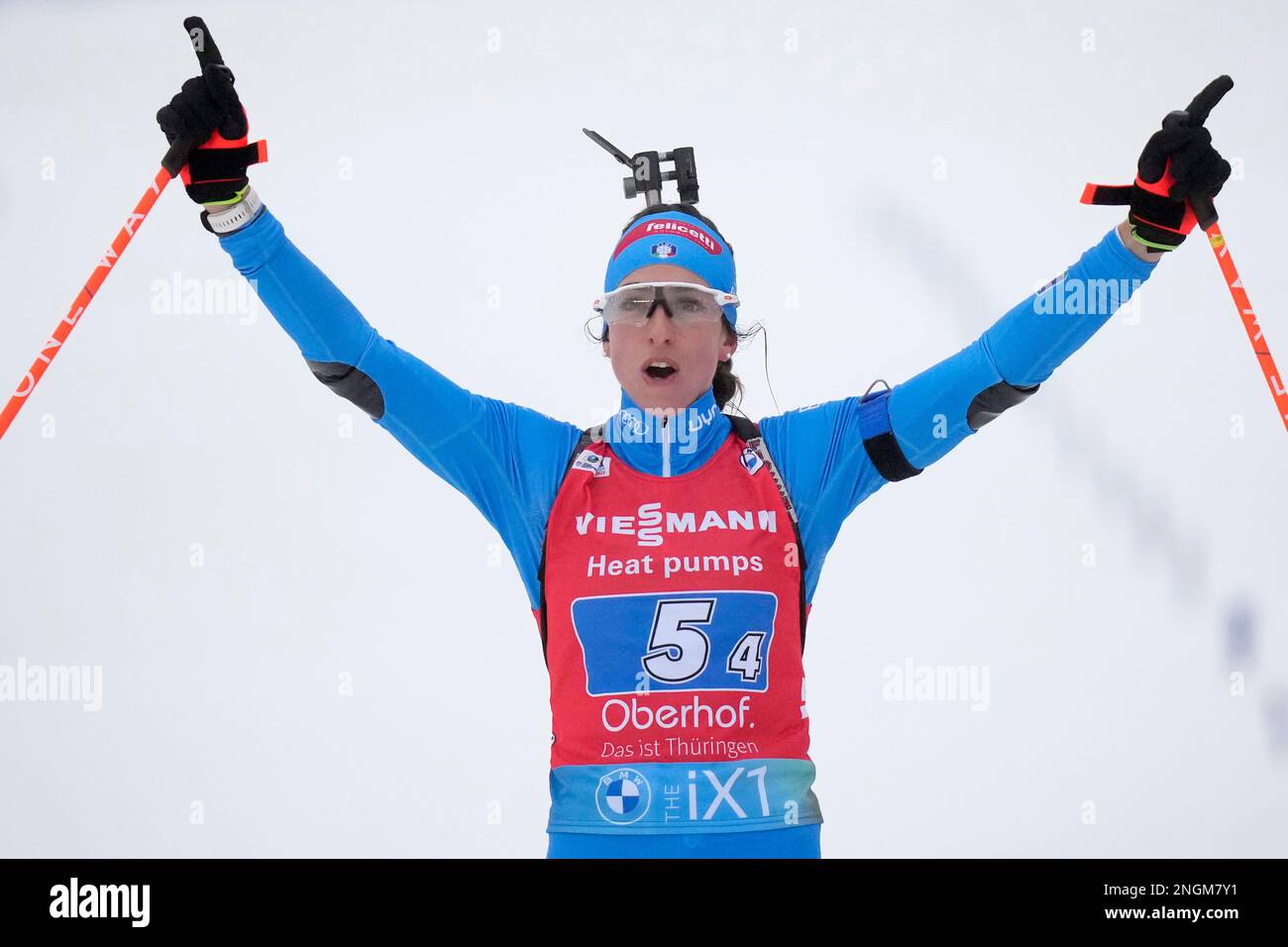Lisa Vittozzi, of Italy, reacts as she crosses the finish line to win ...