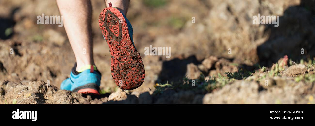 Trail running athlete exercising for fitness and health outdoors on ...