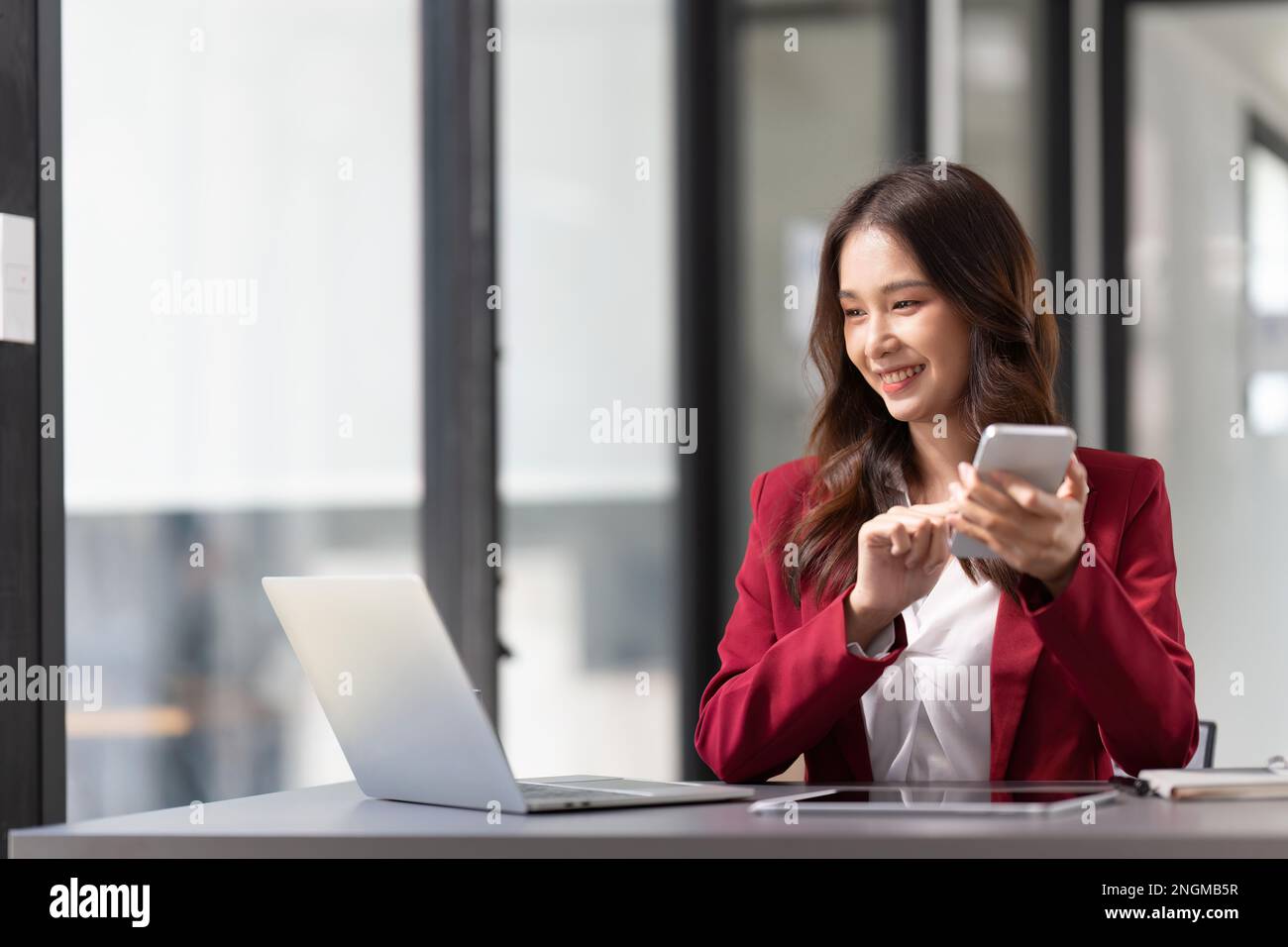 business woman holding smartphone getting message with confirmation ...