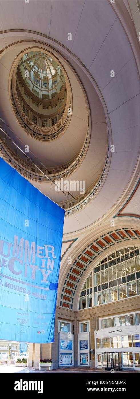 The six-story arch at Rowes Wharf Building shelters a public plaza at ...