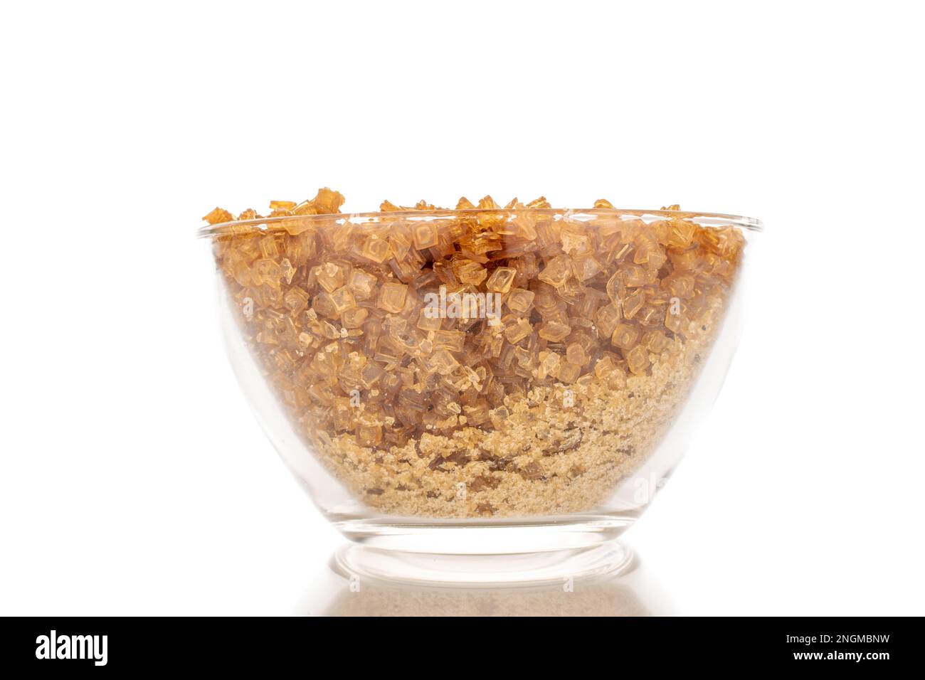 Yellow gelatin granules in a glass plate, macro, isolated on white ...