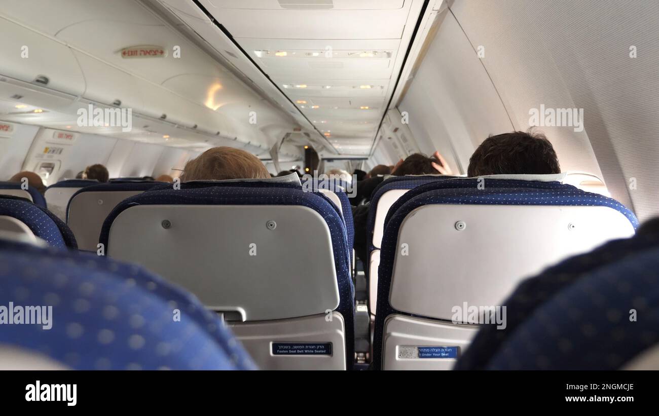 Passenger compartment in the aircraft Stock Photo - Alamy