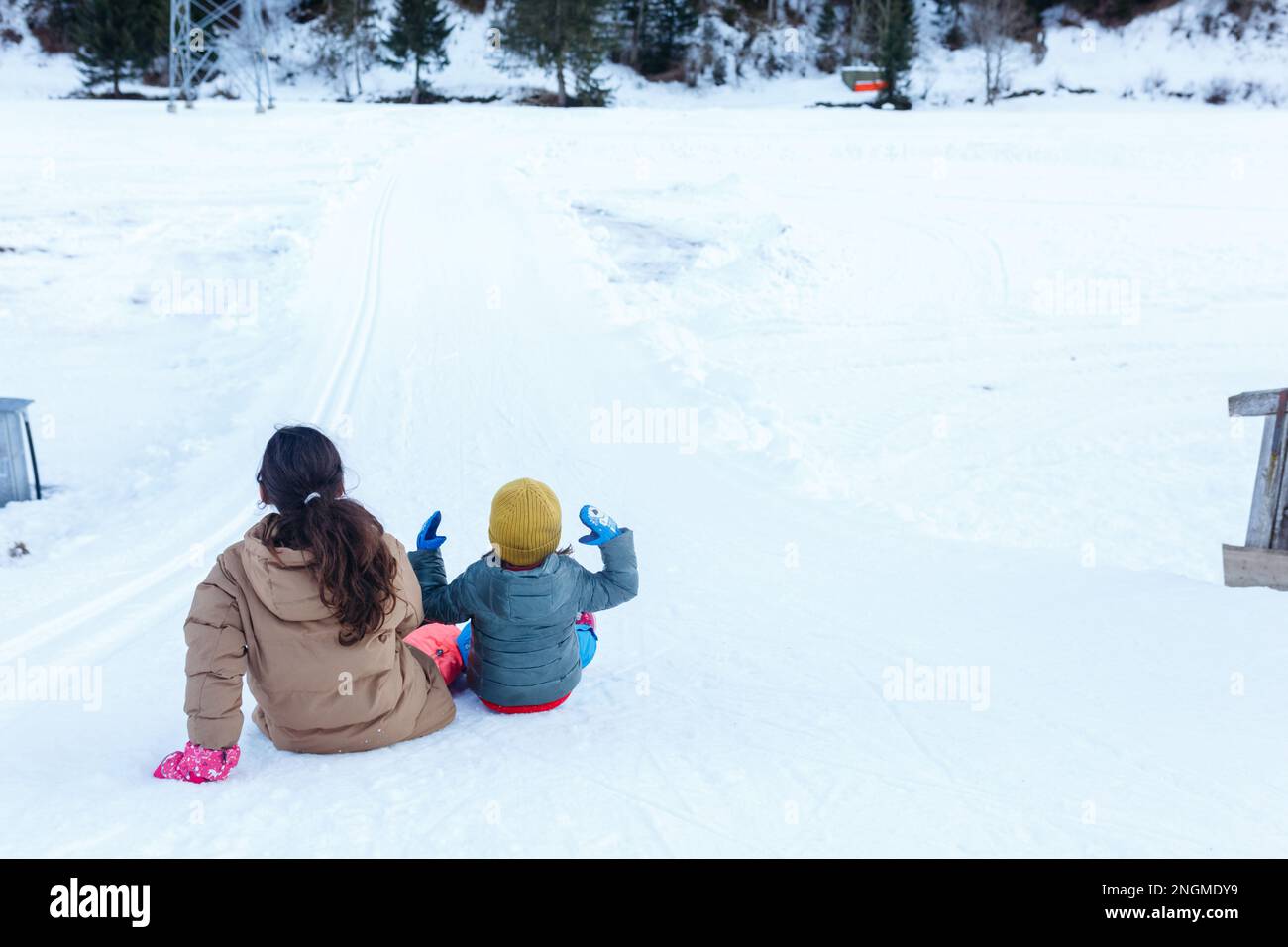 Kids playing downhill hi-res stock photography and images - Alamy