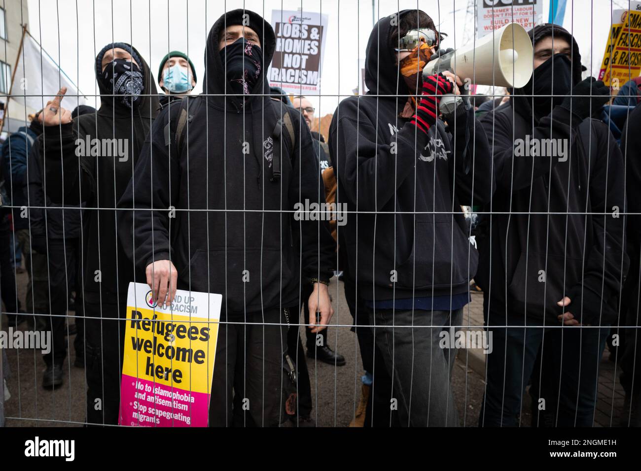 Rotherham, UK. 18th Feb, 2023. Counter protesters shout at the people ...