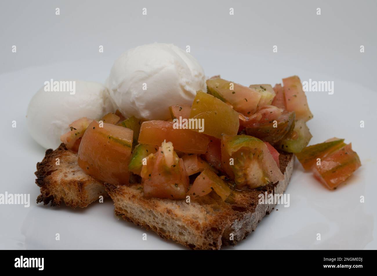 Toasted bread, accompanied by the fresh flavor of mozzarella and the ...