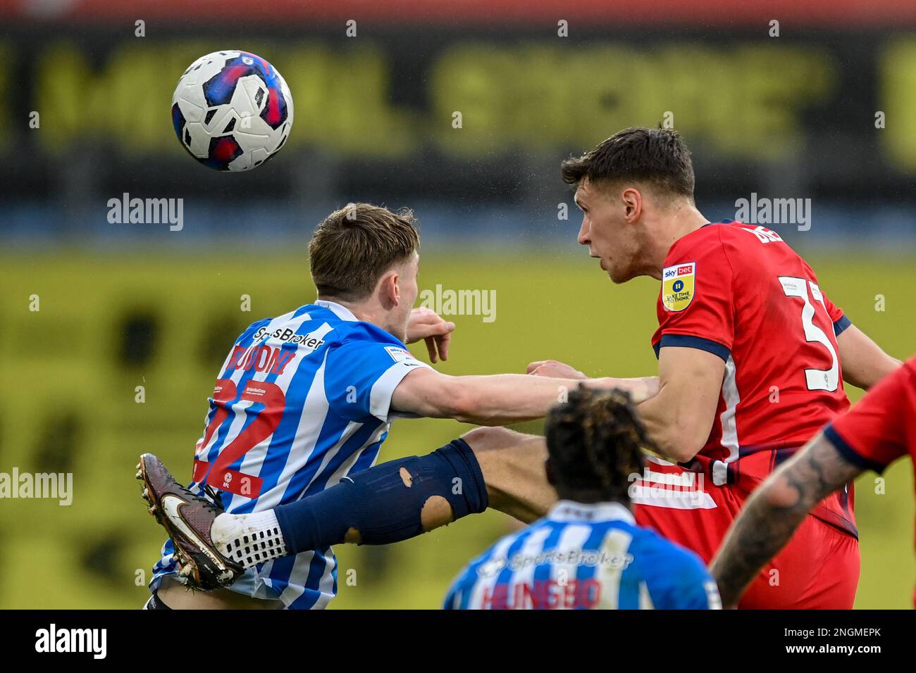 Jack Rudoni #22 of Huddersfield Town and Krystian Bielik #31 of ...